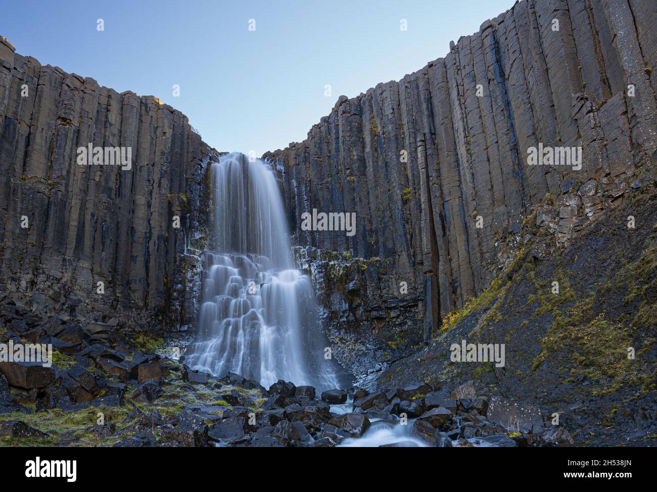 Basalt columns waterfall in Studlagil Canyon, Iceland Stock Photo - Alamy