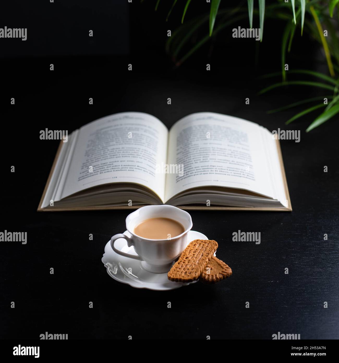 Morning reading and a little cup of coffee Stock Photo - Alamy