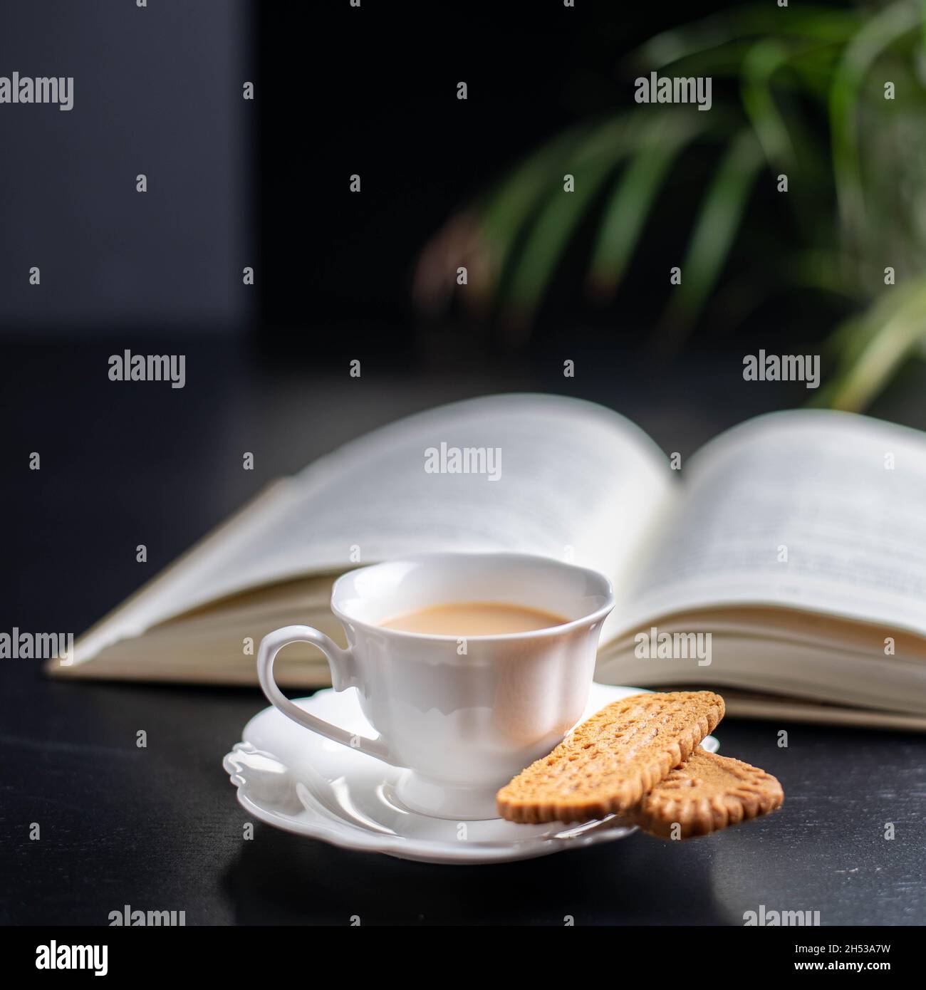 Morning reading and a little cup of coffee Stock Photo - Alamy