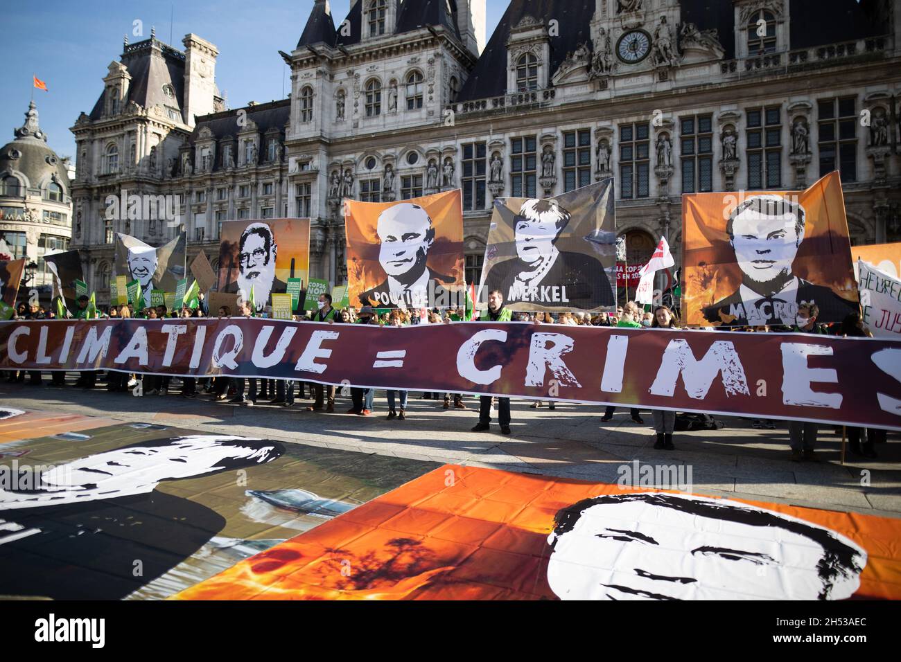 Paris, France. 06th Nov, 2021. Environmental activists display ...