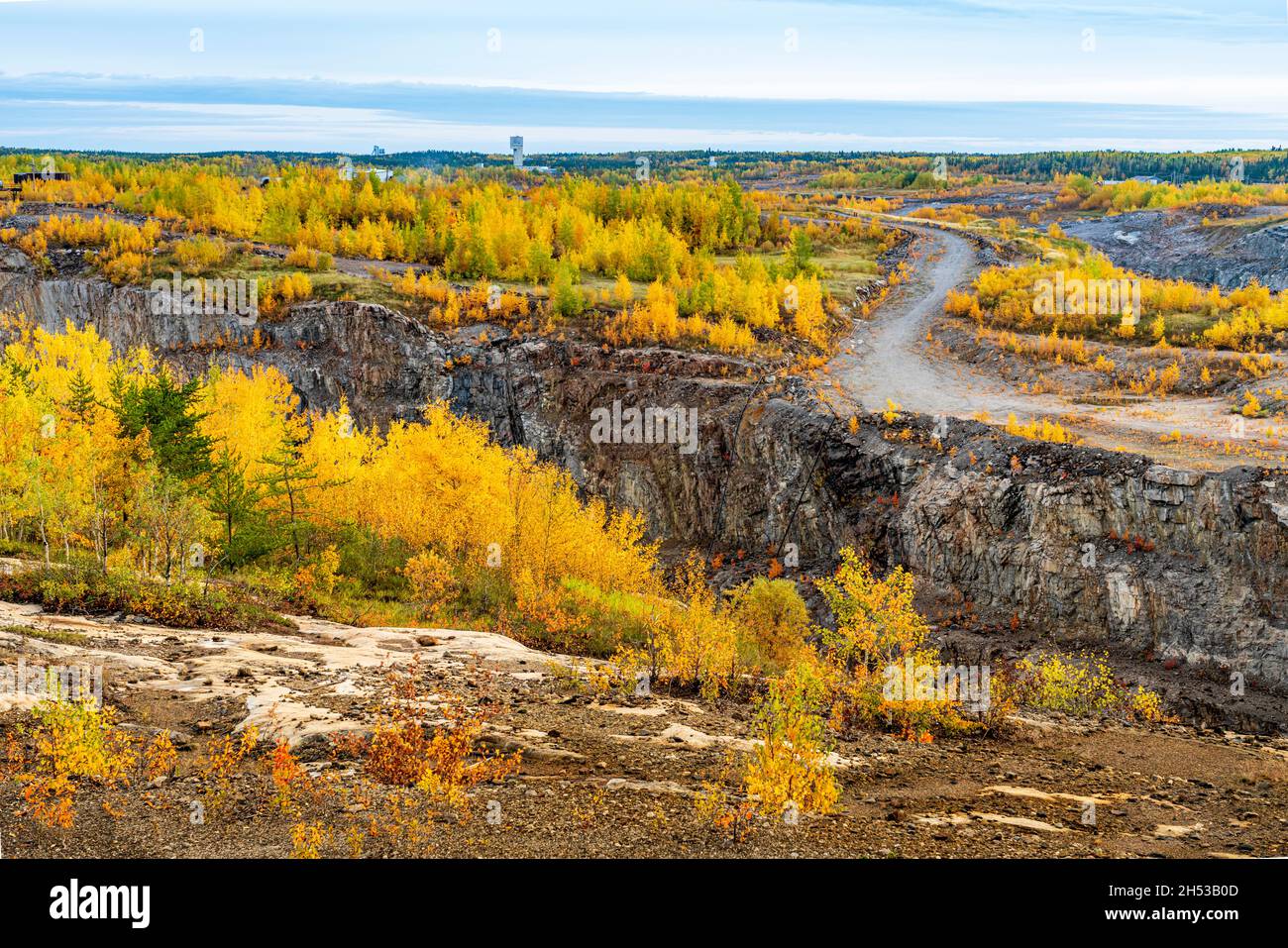 The Vale Canada nickel open pit mine site with fall foliage color in ...