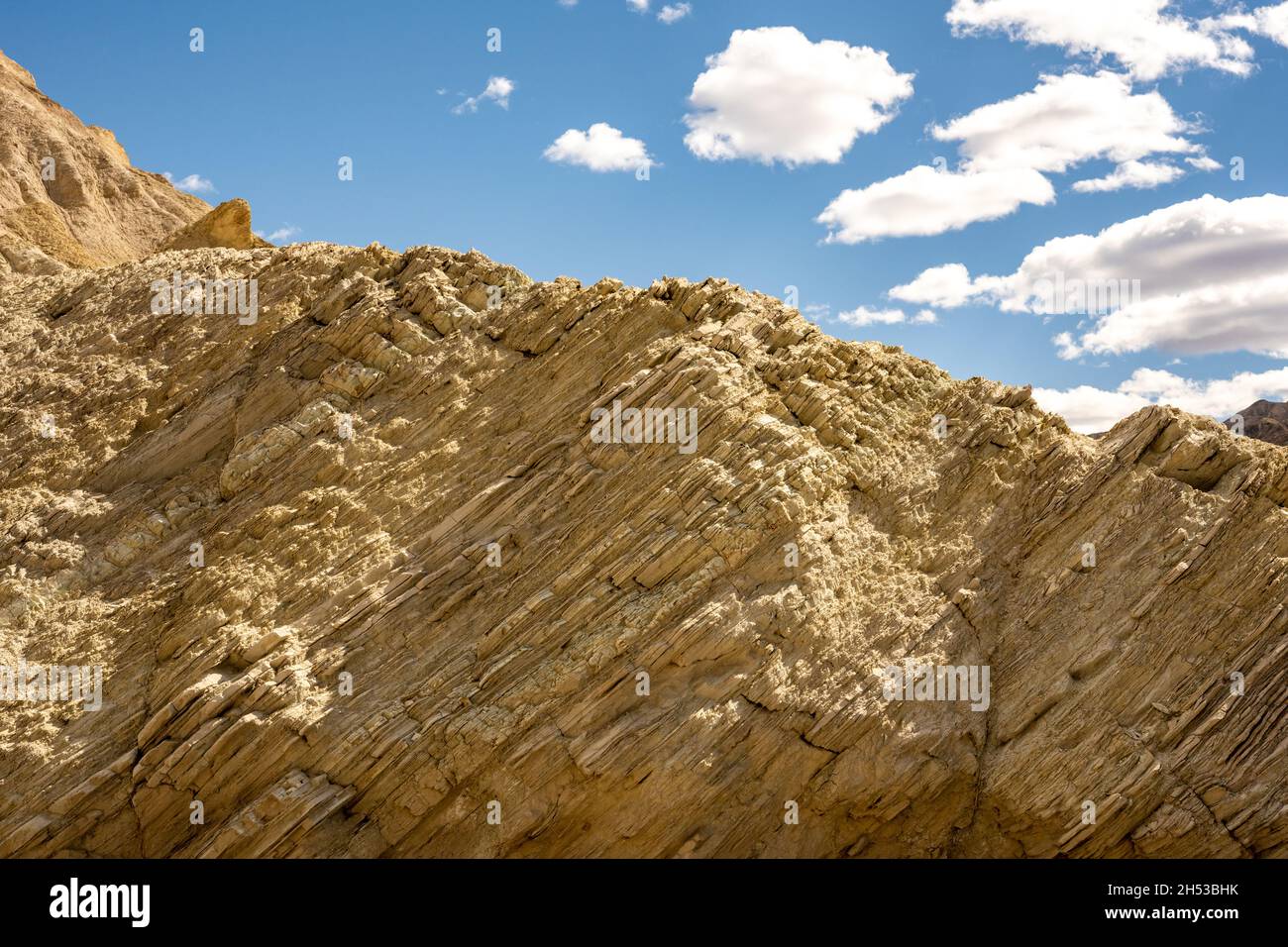 Layers of Stone On A Golden Canyon Hillside in Death Valley National ...