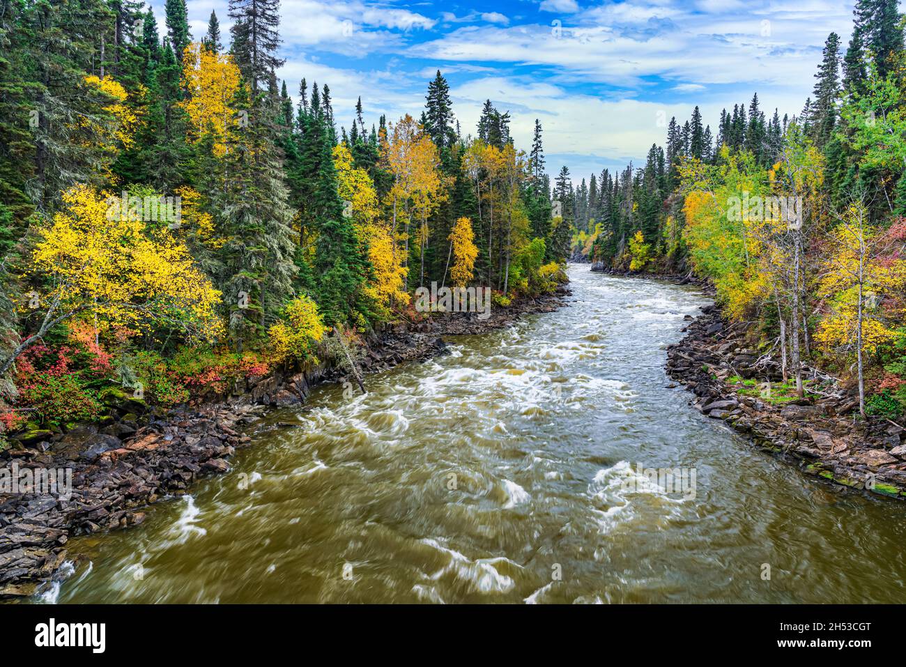 The Grass River and fall foliage color in Pisew Falls Provincial Park ...