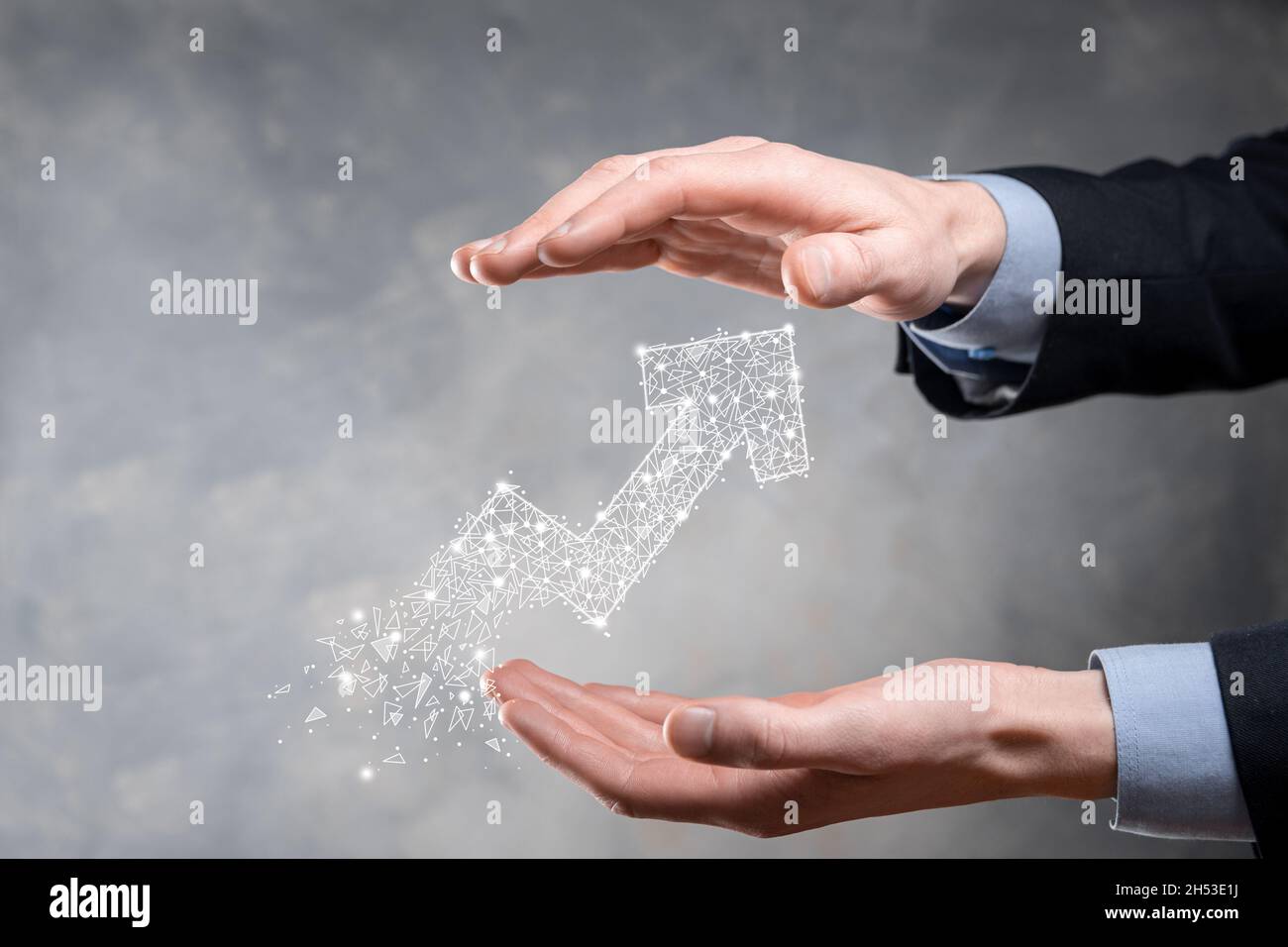 Businessman hold graph, arrow of positive growth icon.pointing at ...