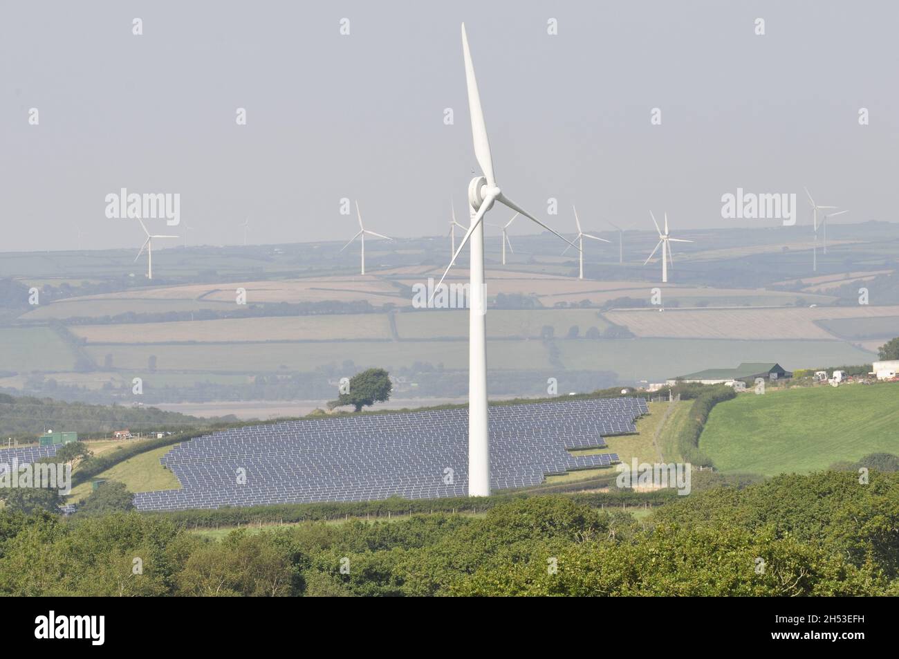 Wind turbines and solar panels on farmland seen looking north from OS ...