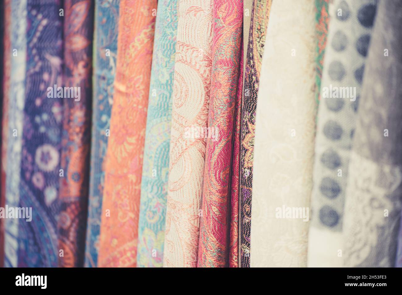 Closeup of a different colored fabric templates variety in the store ...