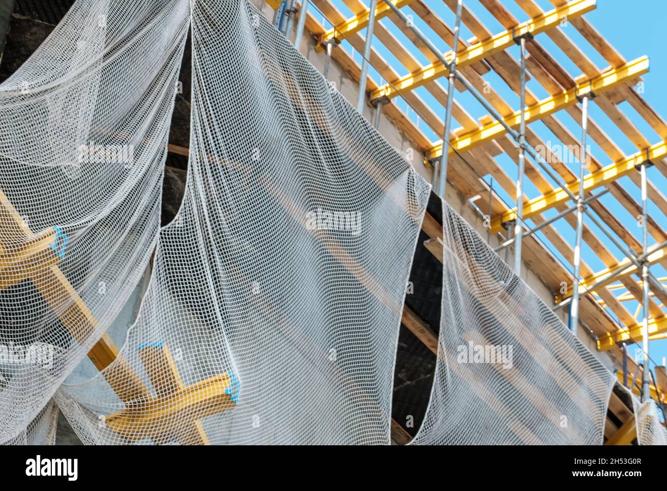 Protective building network used on building Stock Photo - Alamy