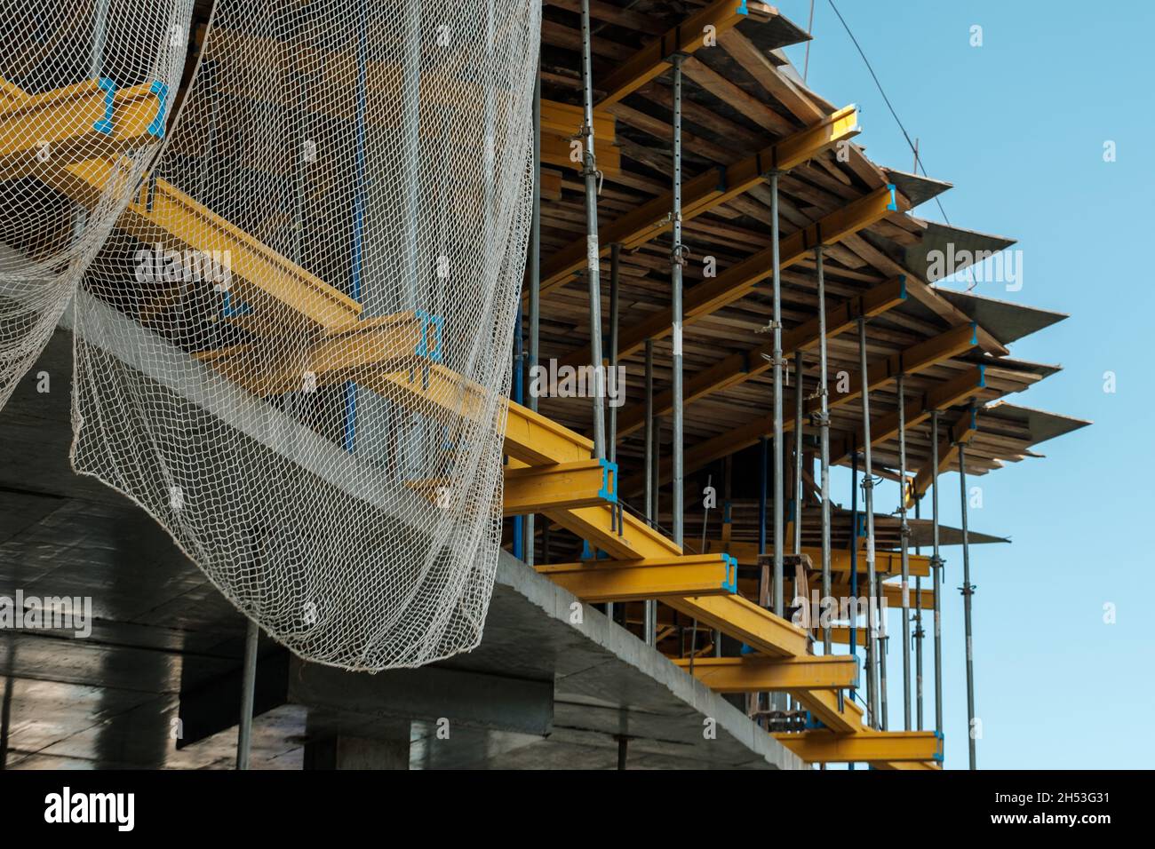 Protective building network used on building. Falsework used on ...