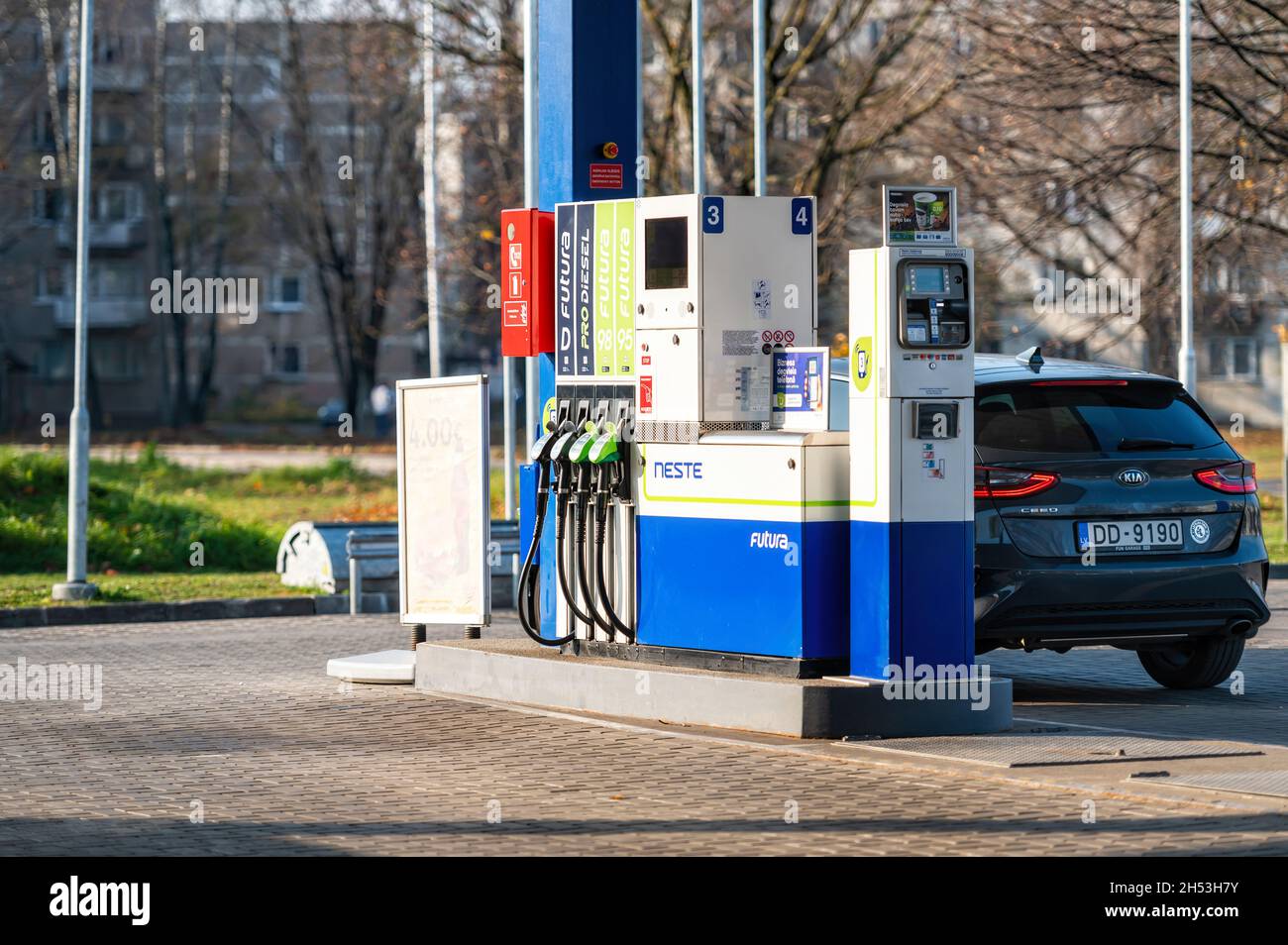 Riga, Latvia, November 2, 2021: Gas filling point with payment terminal ...