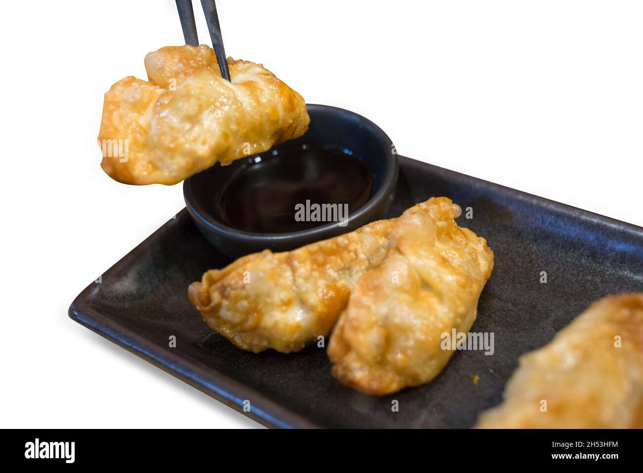 Top view of gyoza with chopsticks on white background Stock Photo - Alamy