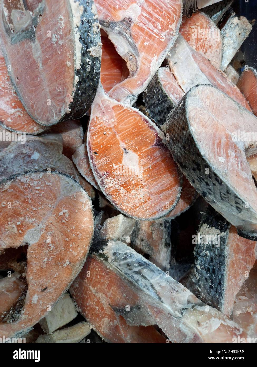 Food and seafood. Frozen red fish steaks, frozen salmon, trout steaks ...