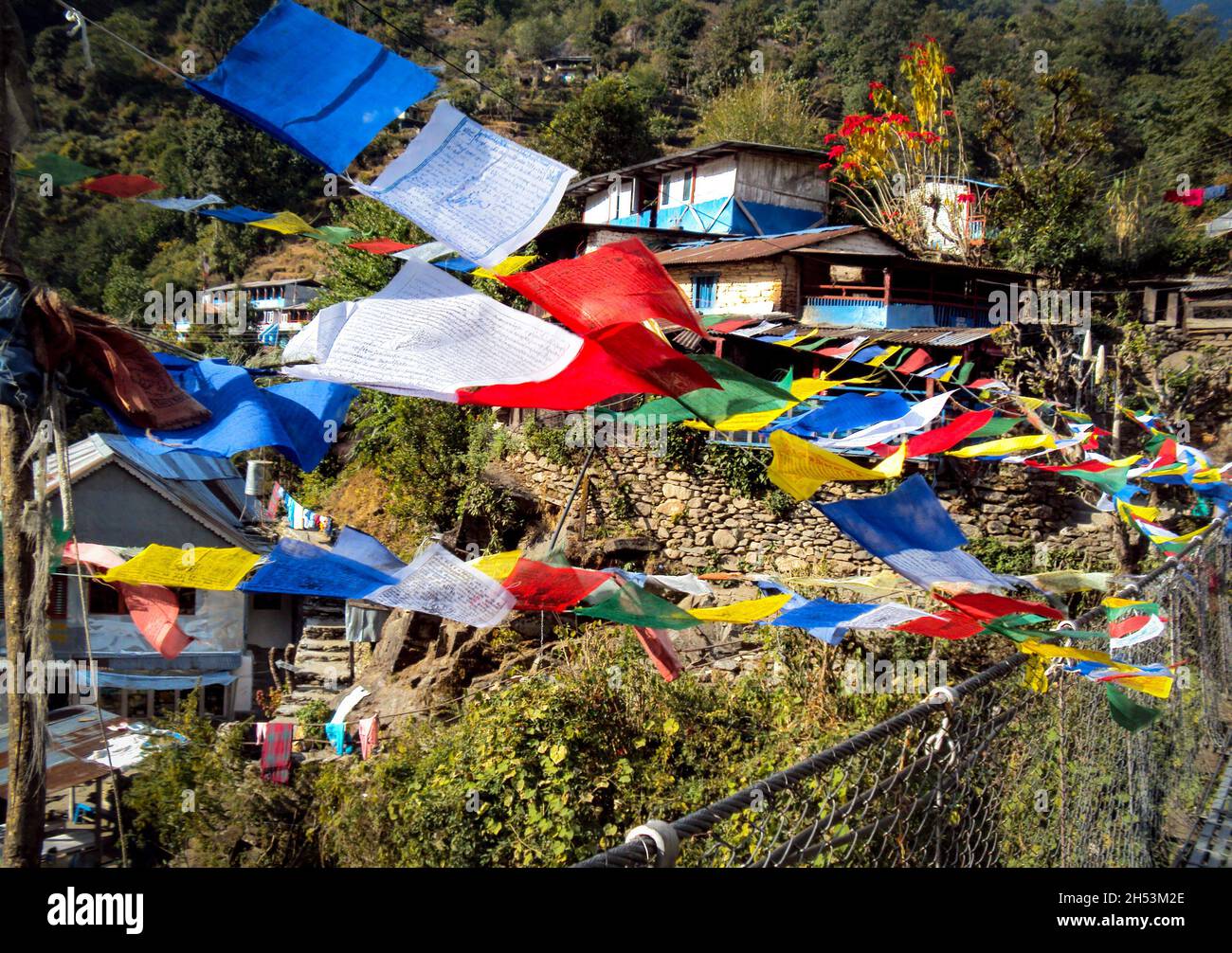 Prayers Flags: The beauty of villages of the Himalayas Stock Photo - Alamy