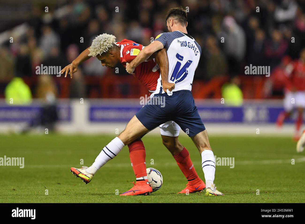NOTTINGHAM, GBR. NOV 6TH Lyle Taylor of Nottingham Forest battles with ...