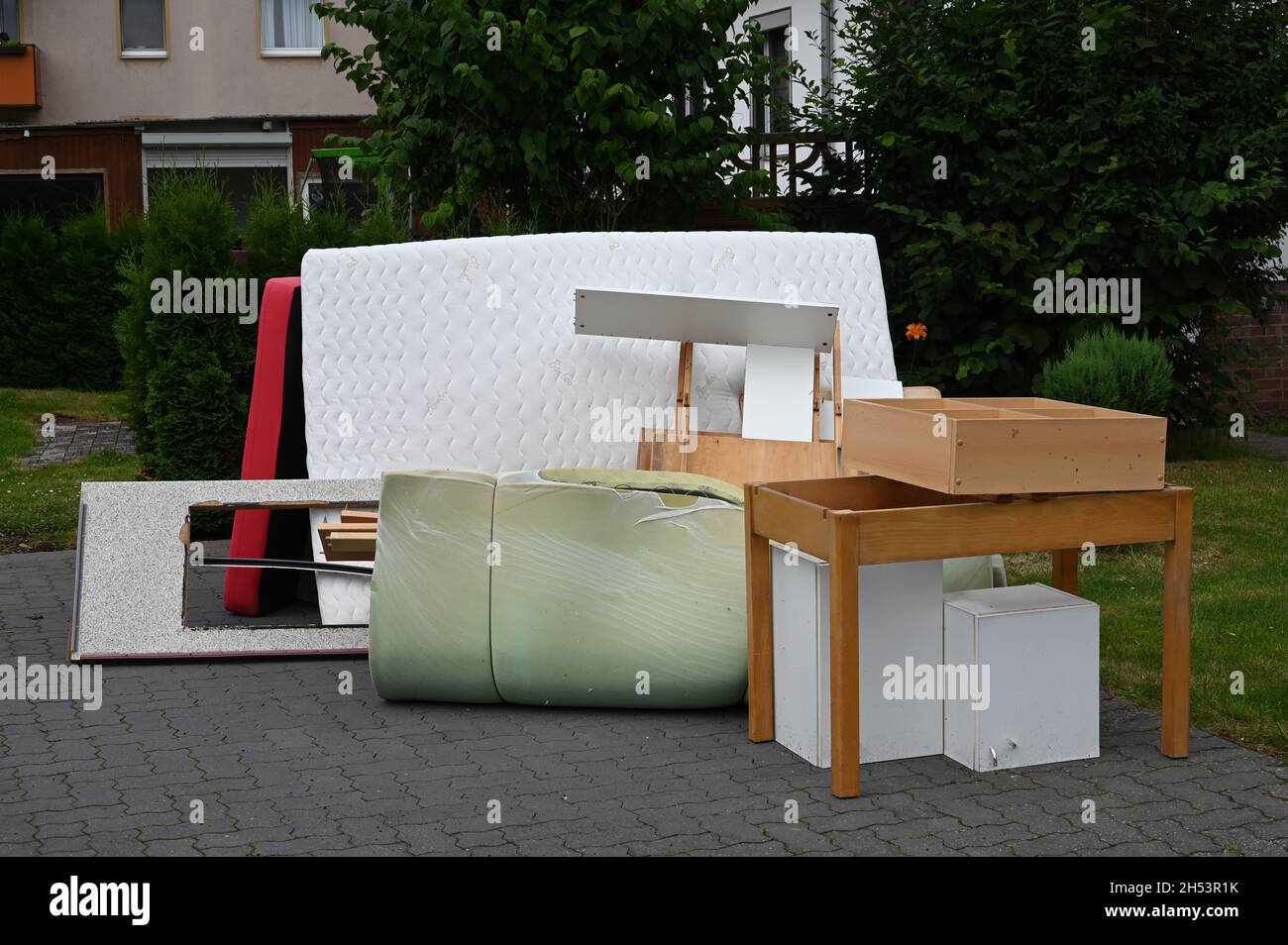 Bulky waste on the roadside Stock Photo - Alamy