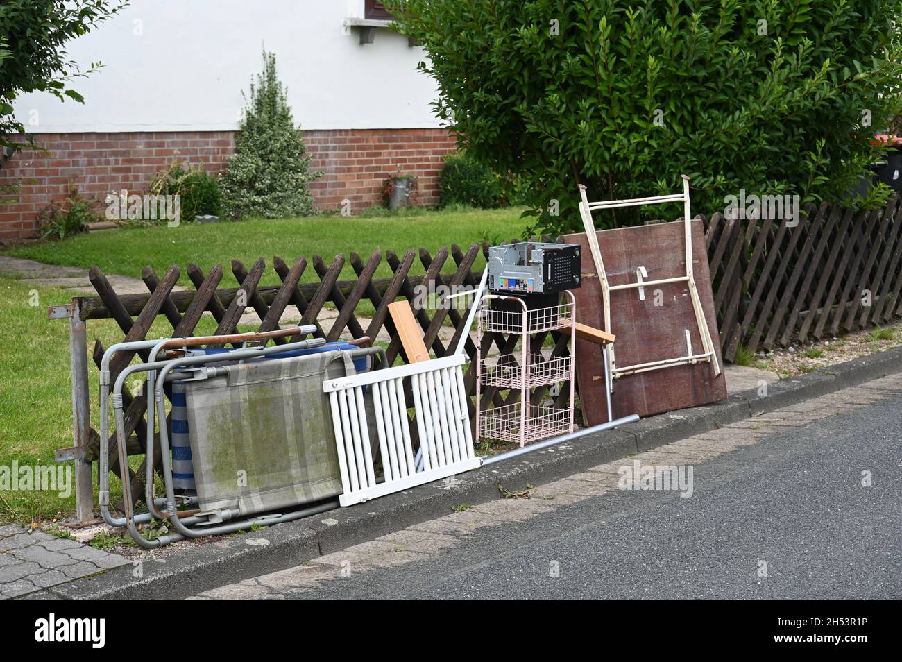 Bulky waste on the roadside Stock Photo - Alamy