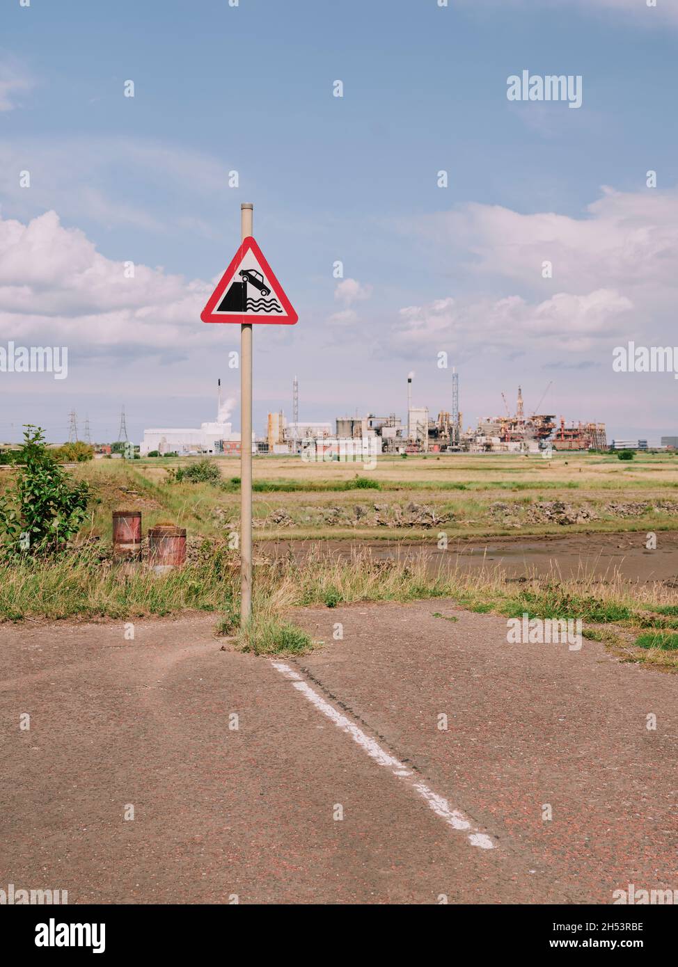 A falling car road sign in the strange industrial and nature reserve ...