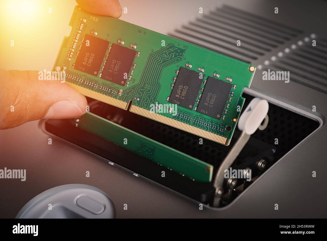 Upgrading the personal computer concept. Closeup the new memory module ...