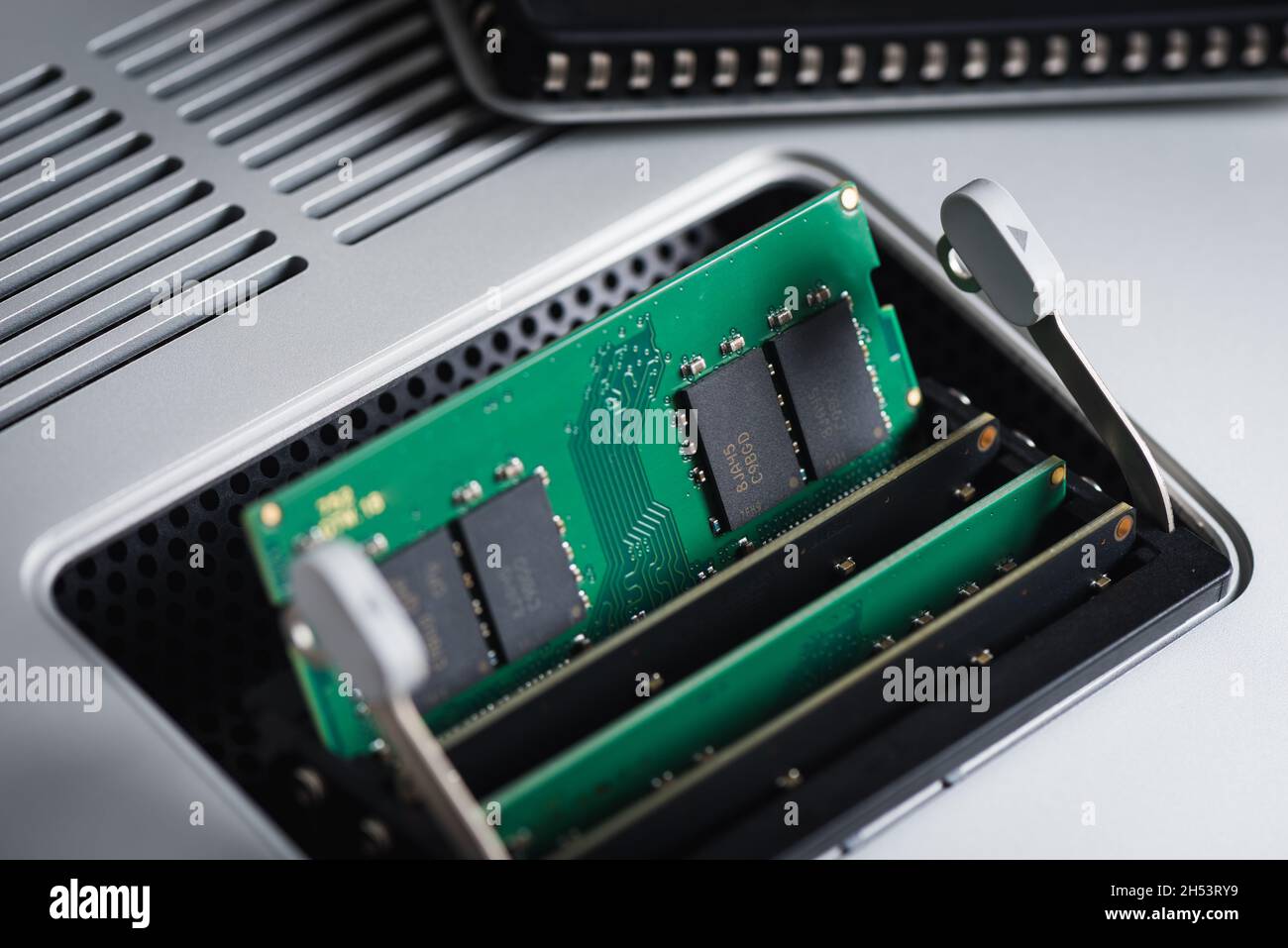 Upgrading the personal computer concept. Closeup the new memory module ...