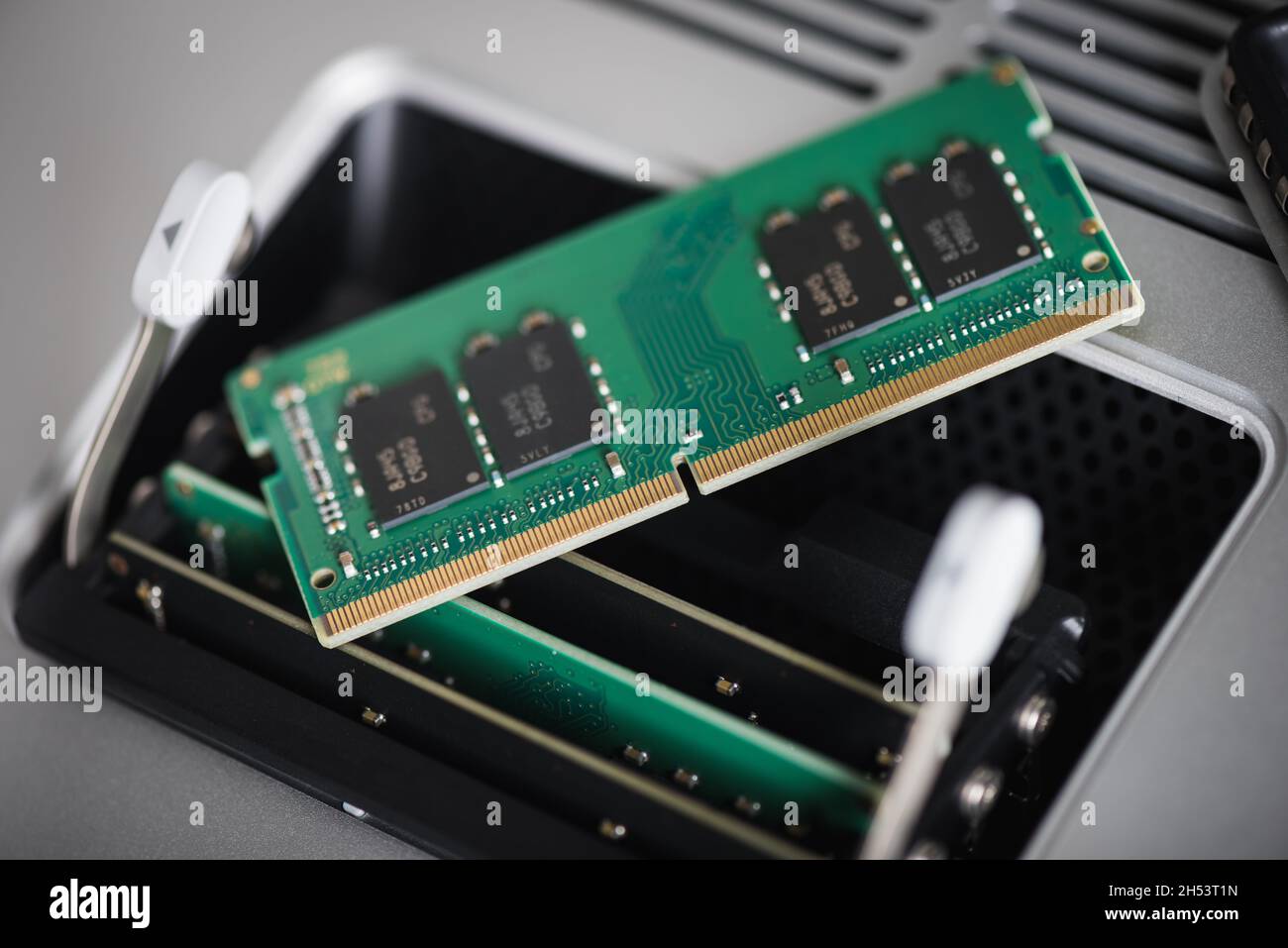 Upgrading the personal computer concept. Closeup the new memory module ...