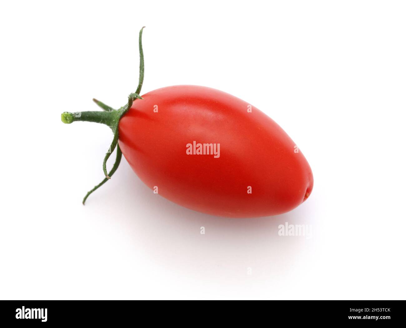 single tomato isolated on white background Stock Photo - Alamy