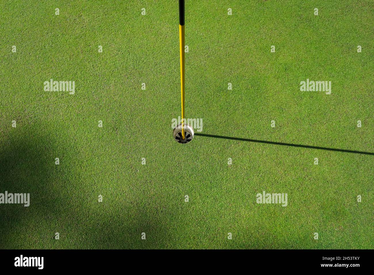 View from above. Golf hole on a green grass Stock Photo - Alamy