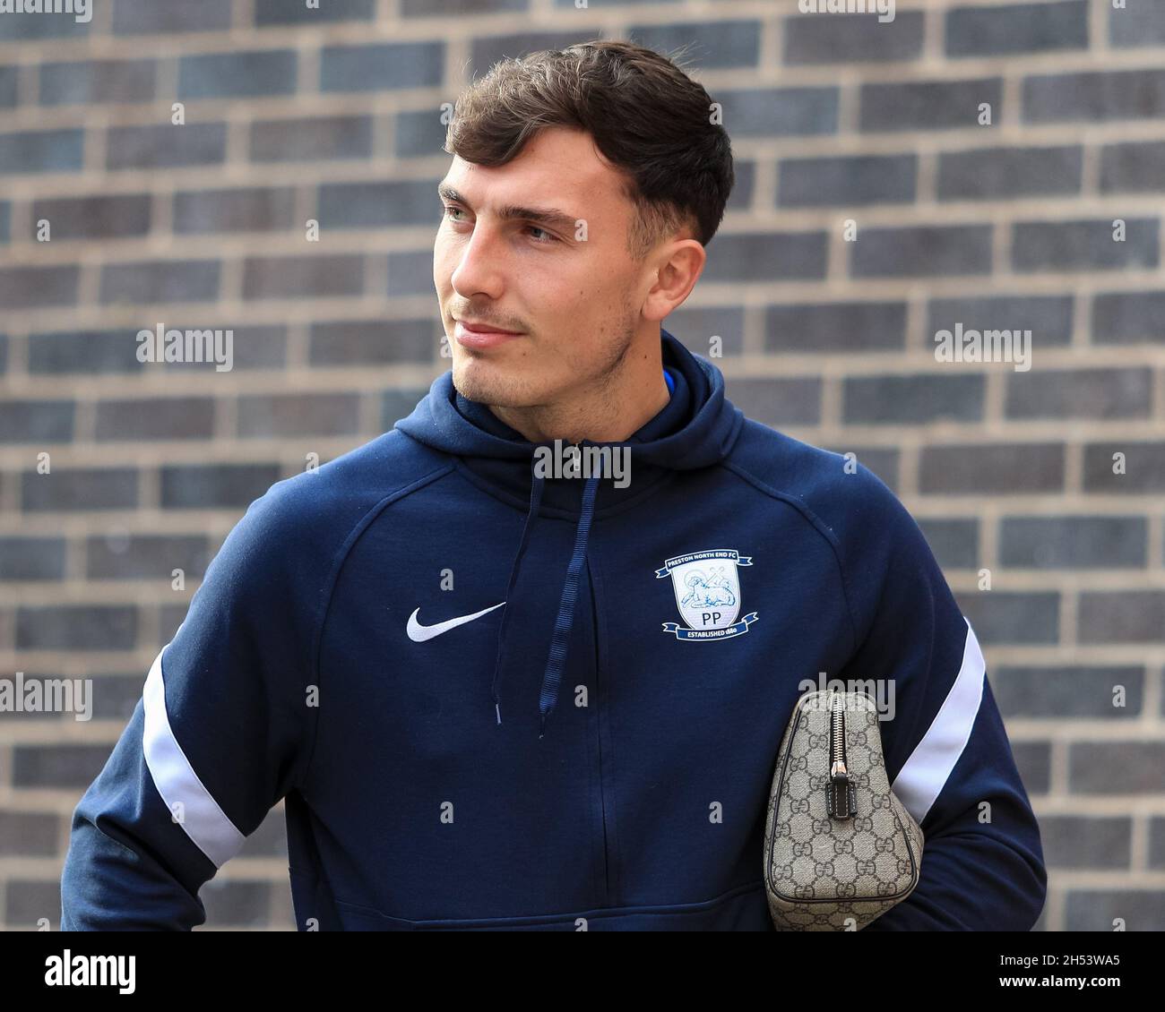 Josh Earl #32 of Preston North End gets off the team bus on arrival at ...