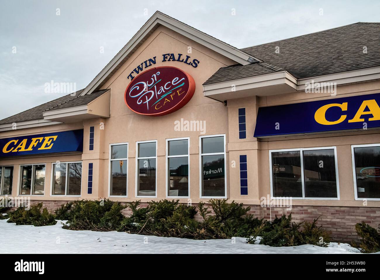 Reflections in the windows of Our Place Cafe in St. Croix Falls, Wisconsin Stock Photo - Alamy