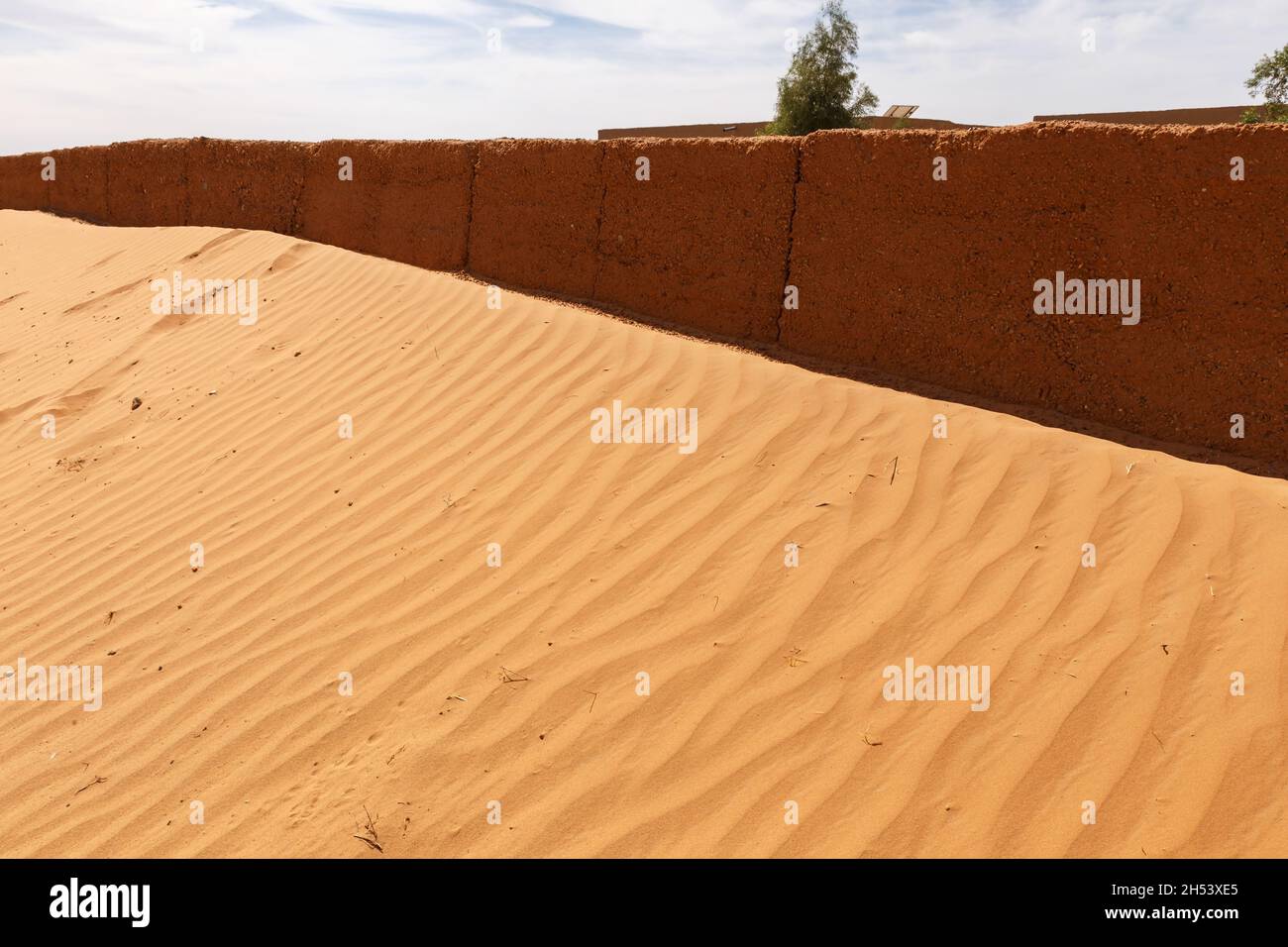 Sand covered fence in the Sahara desert. Morocco Stock Photo - Alamy
