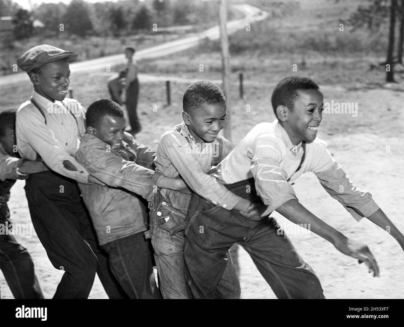 Boys playing school recess Black and White Stock Photos & Images - Alamy
