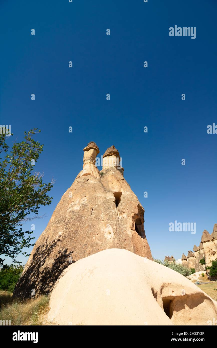 Fairy chimney or Peri Bacasi in Cappadocia Turkey. Fairy chimneys in ...