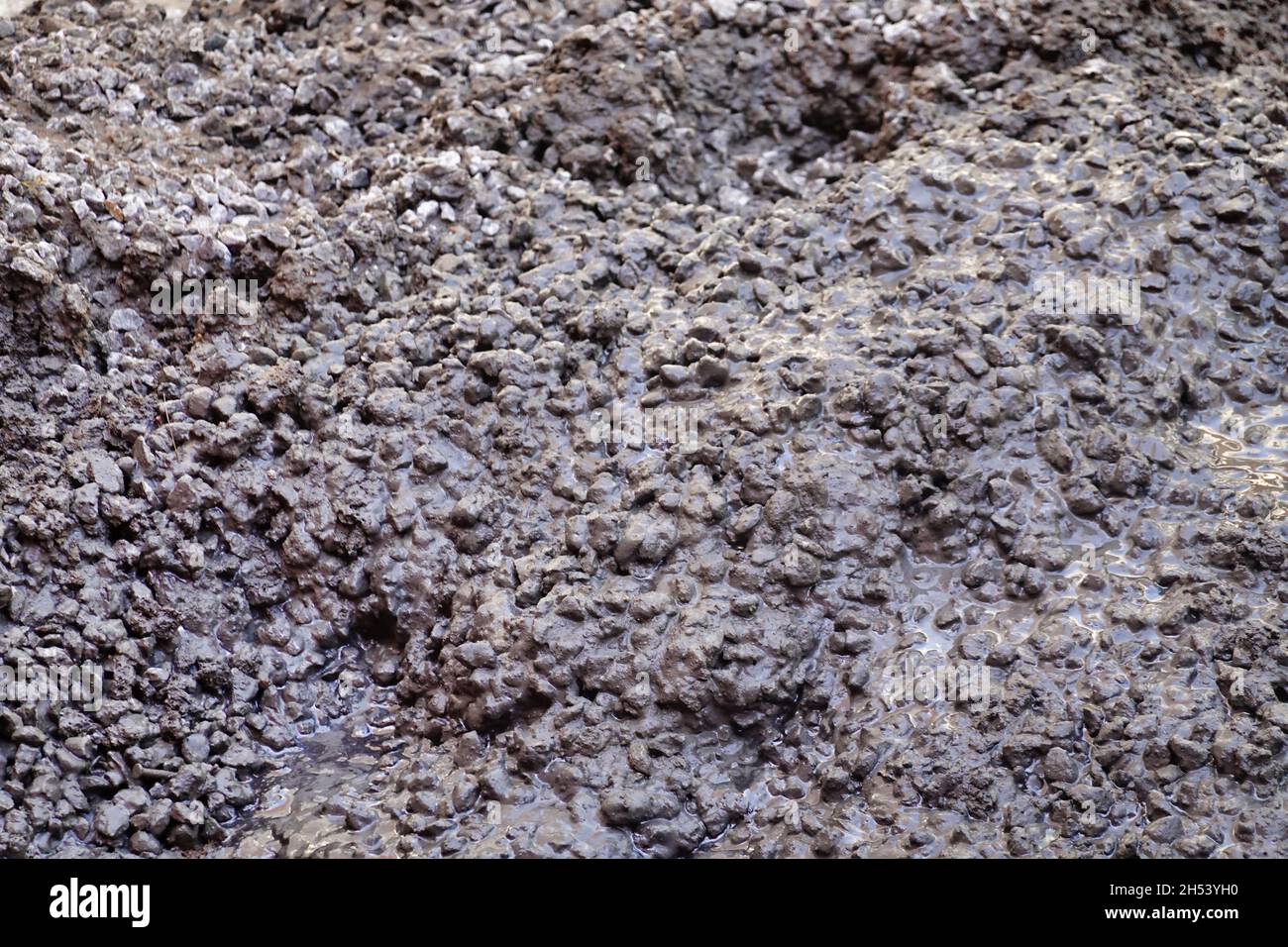 Closeup of cement and stones mixture used for a building structure ...
