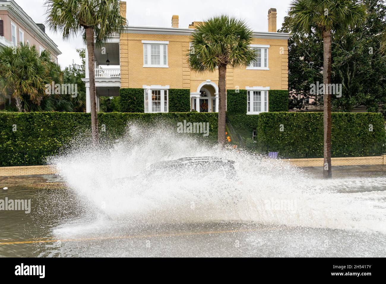Charleston, United States. 06th Nov, 2021. A car is engulfed by flood ...