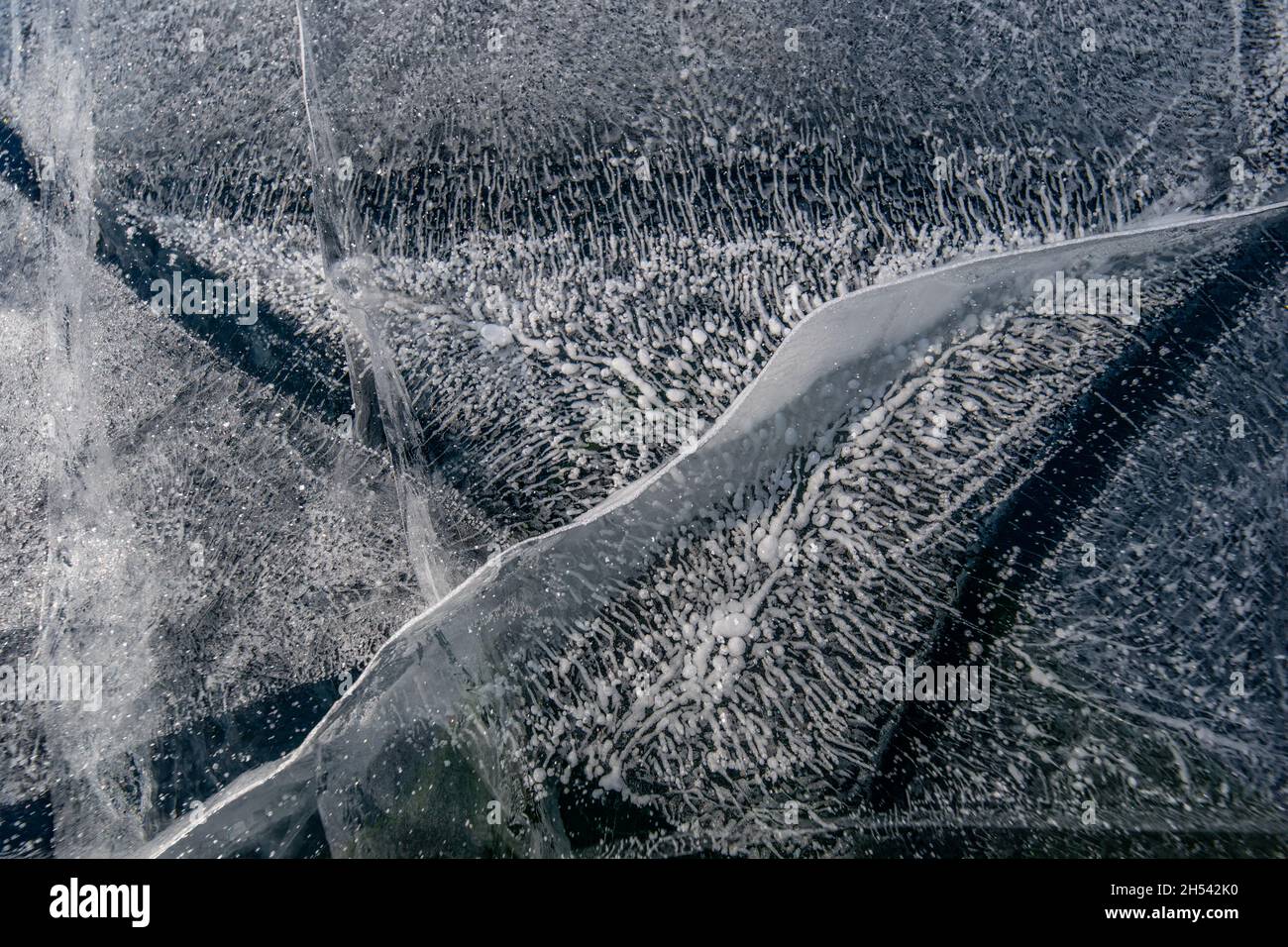 Ice cover of Baikal lake with specific pattern Stock Photo - Alamy