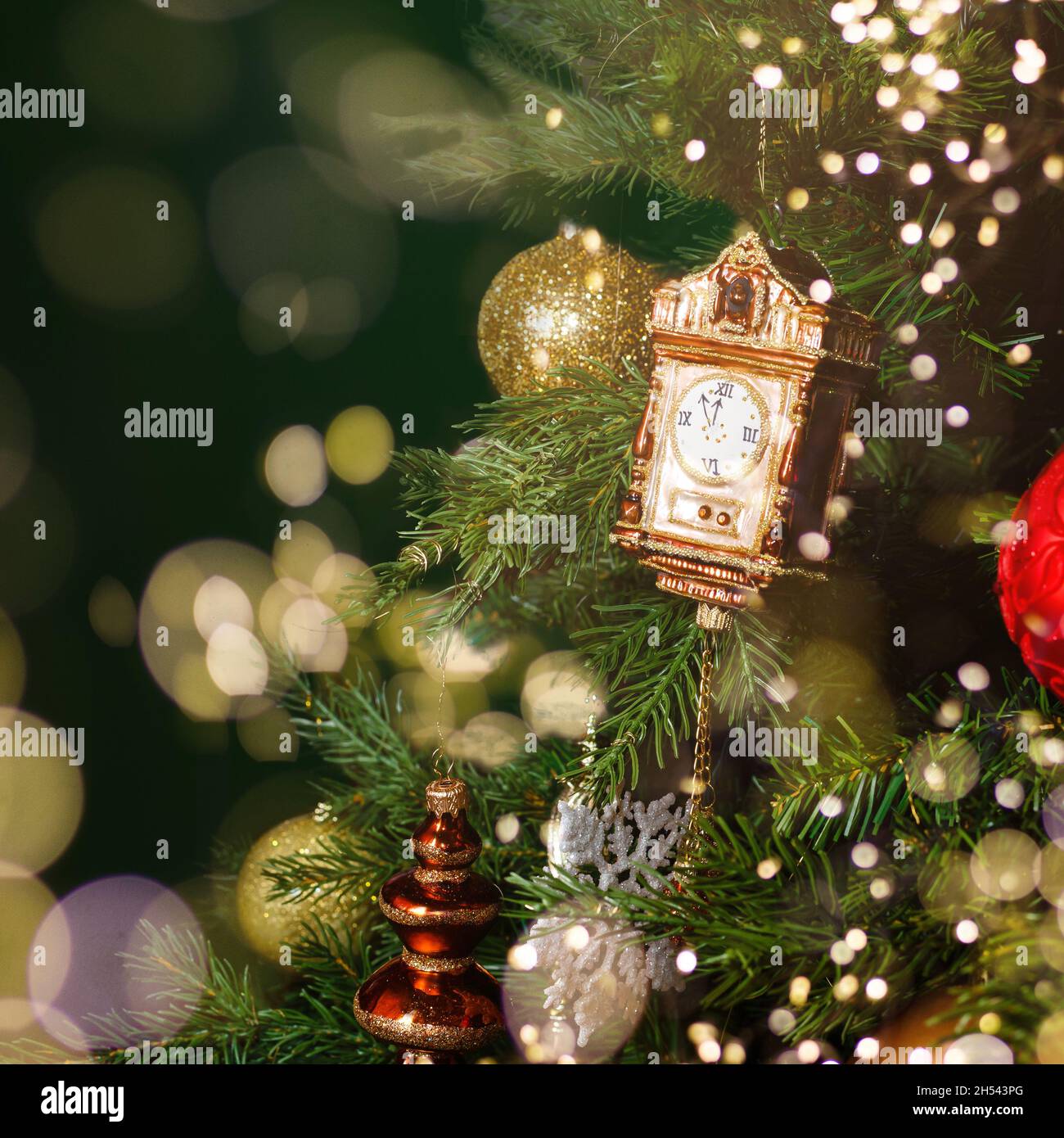 Decorated Christmas tree on blurred, sparkling and fairy background ...