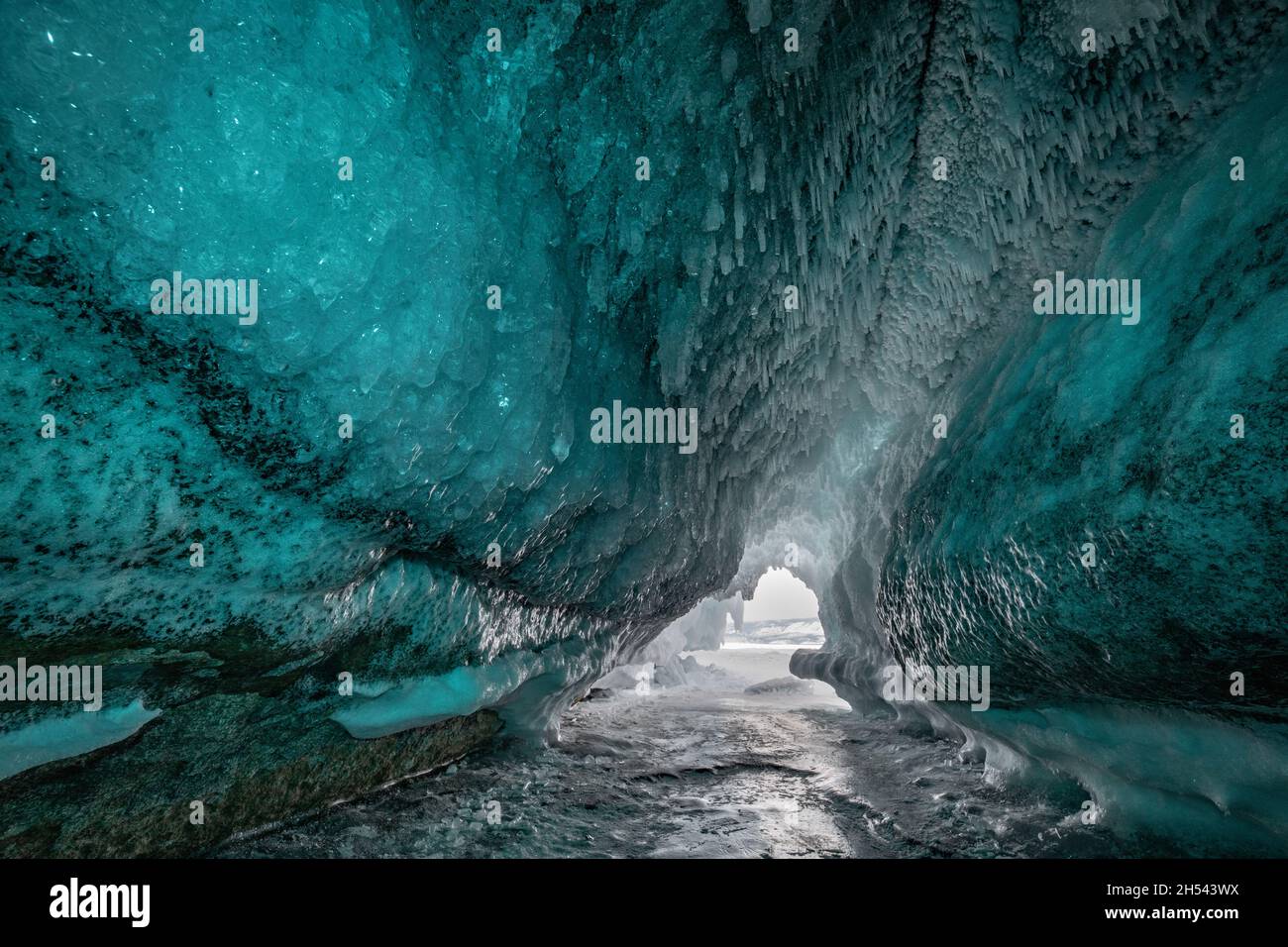 Ice grotto on Baikal lake Stock Photo - Alamy