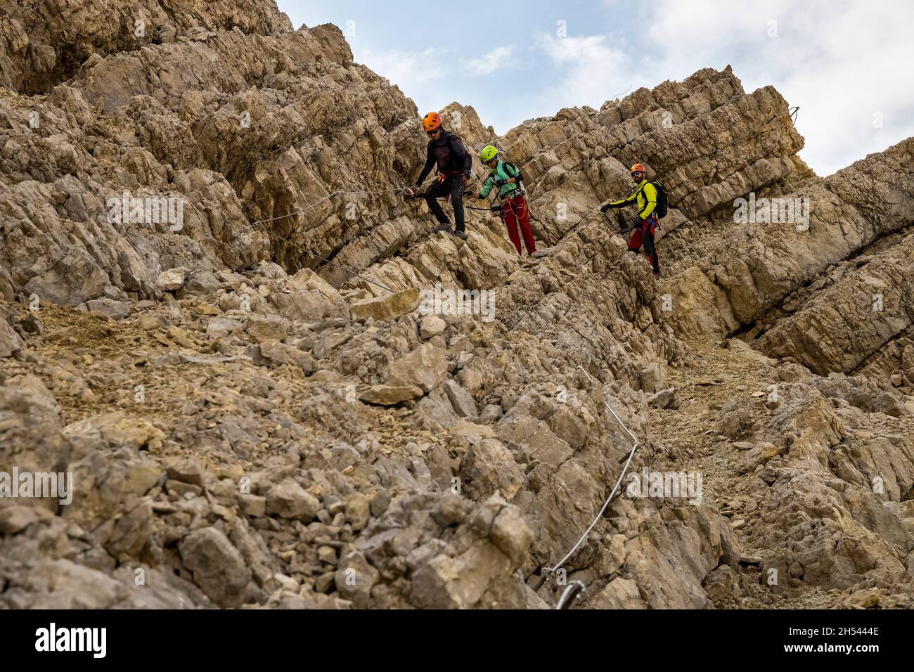 Italy Veneto - Hikers along the Ferrata Formenton Stock Photo - Alamy