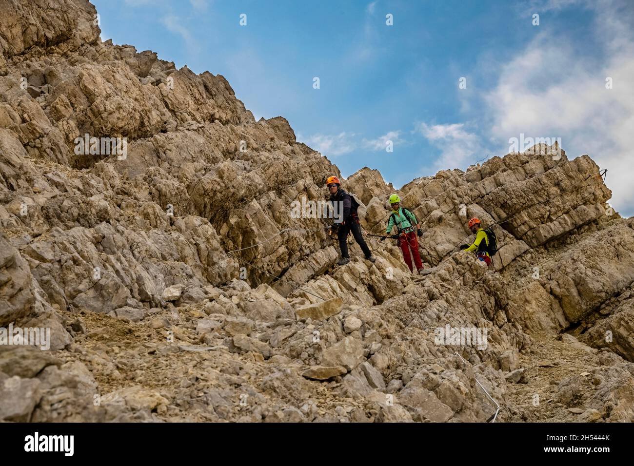 Italy Veneto - Hikers along the Ferrata Formenton Stock Photo - Alamy