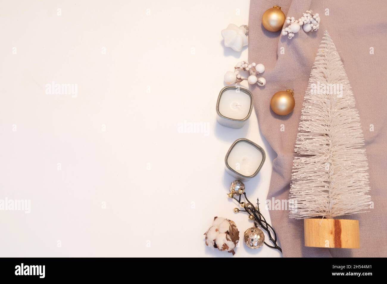 Snow fir tree, photo frames and christmas decor on rope over rustic ...