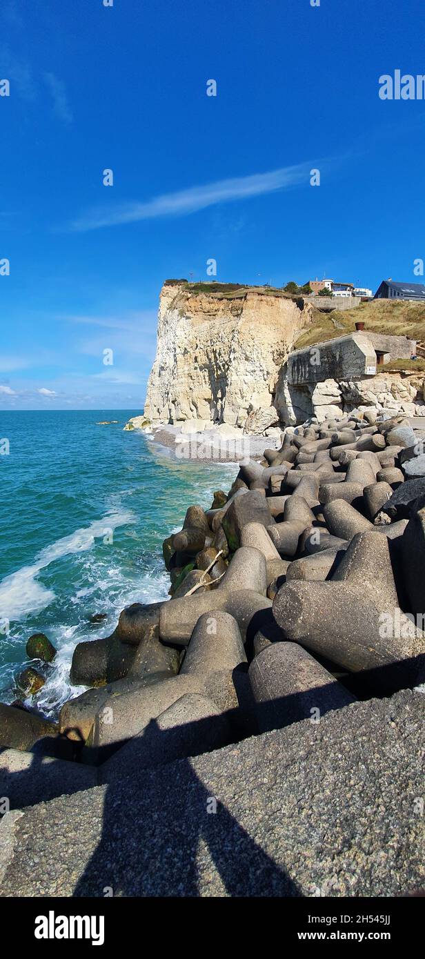 Close-up shot of breakwaters on the beautiful shore background Stock ...