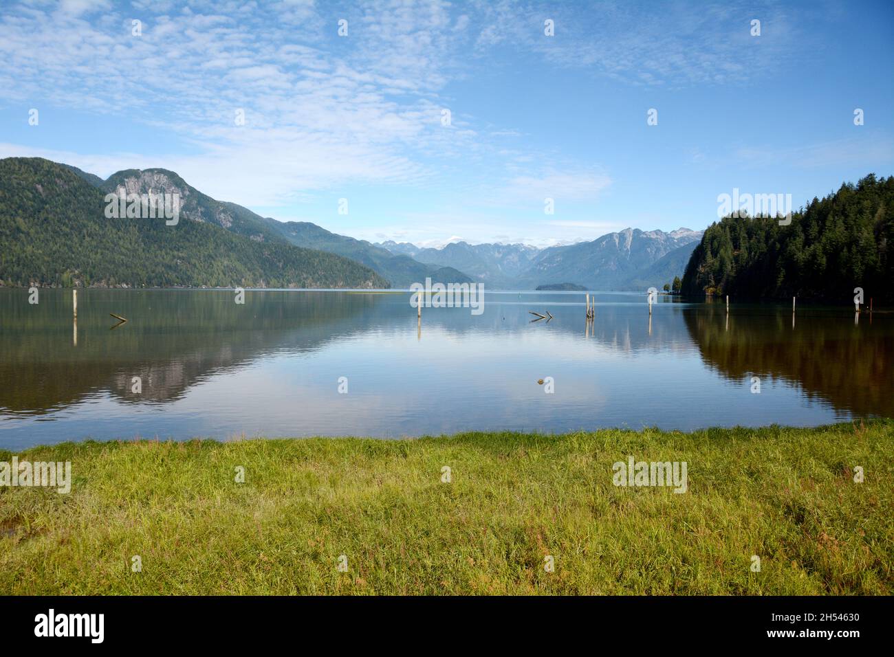 Pitt Lake, one of the world's largest tidal lakes, and the mountains of ...