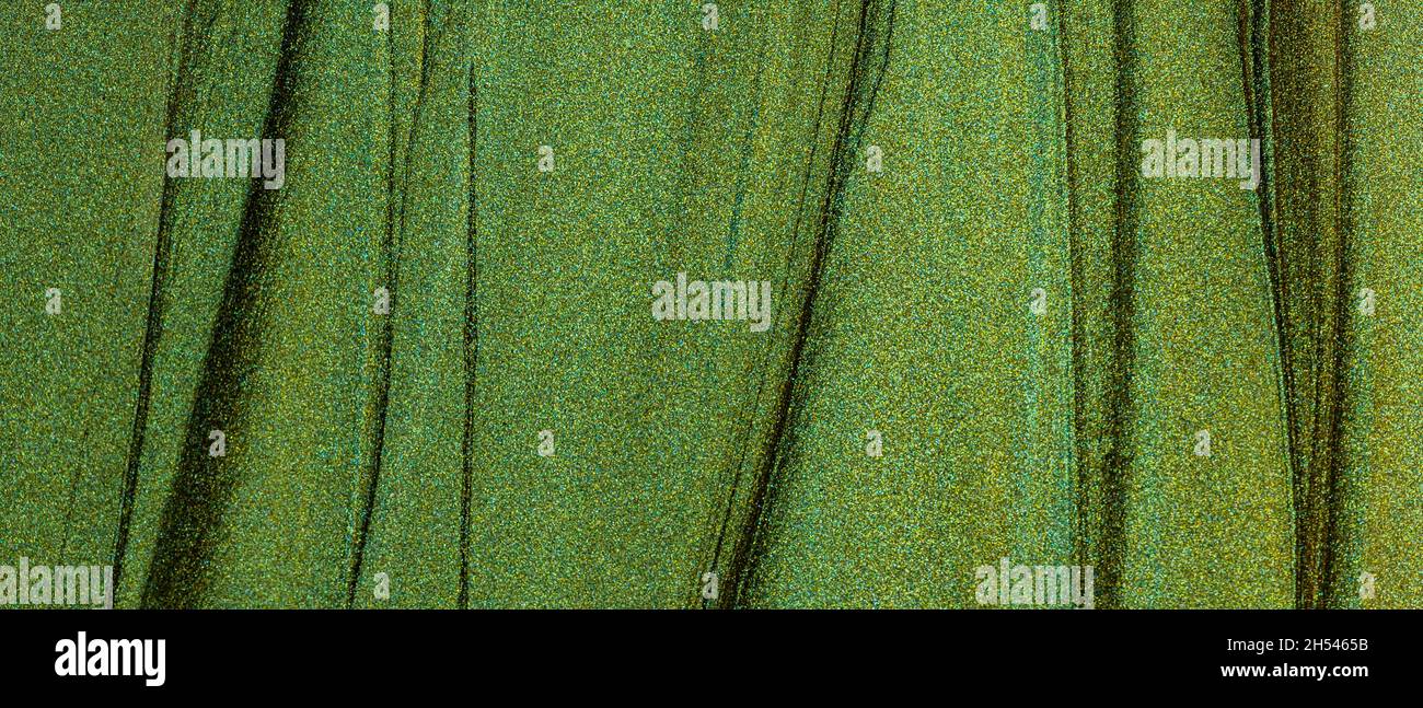 Green glitter texture. Background with brush strokes of shiny oil ...