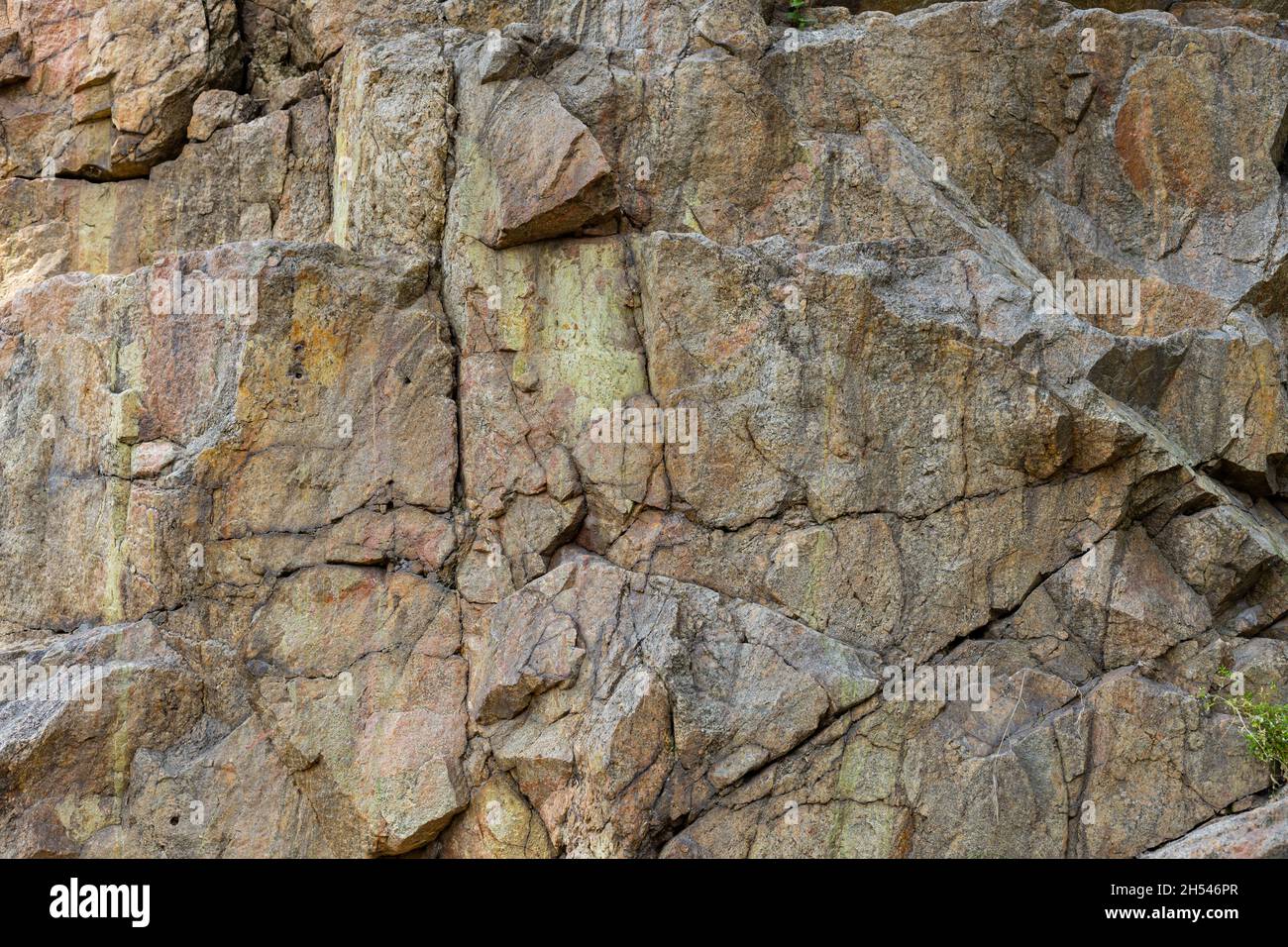 Destruction of the rock of the mountain after the explosion. Cracks in ...