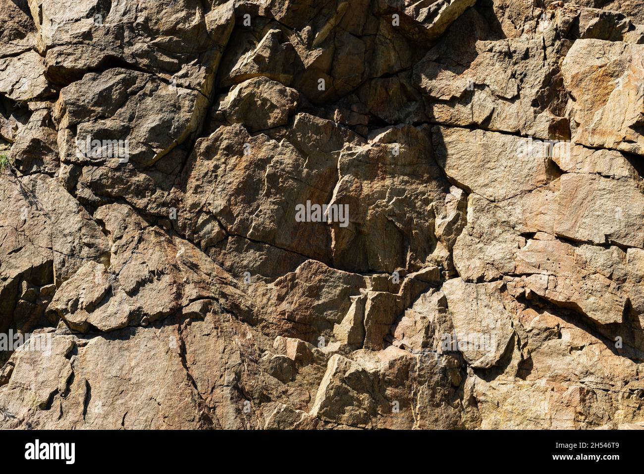 Destruction of the rock of the mountain after the explosion. Cracks in ...