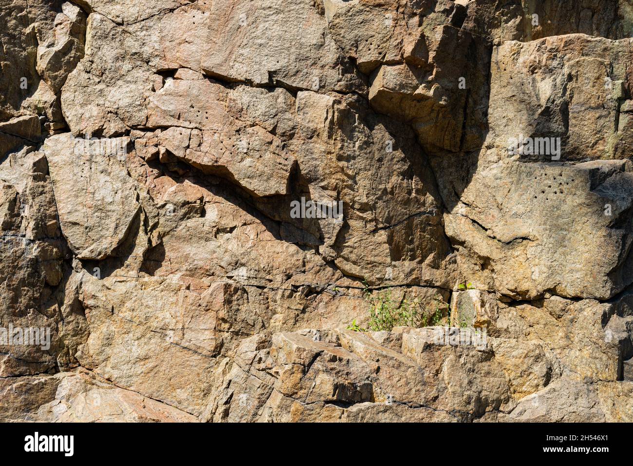 Destruction of the rock of the mountain after the explosion. Cracks in ...