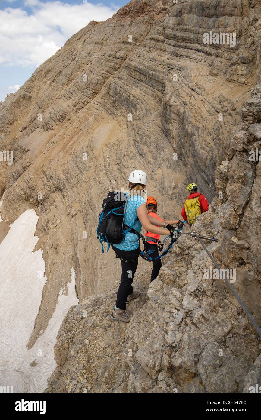 Italy Veneto - Hikers along the Ferrata Formenton Stock Photo - Alamy