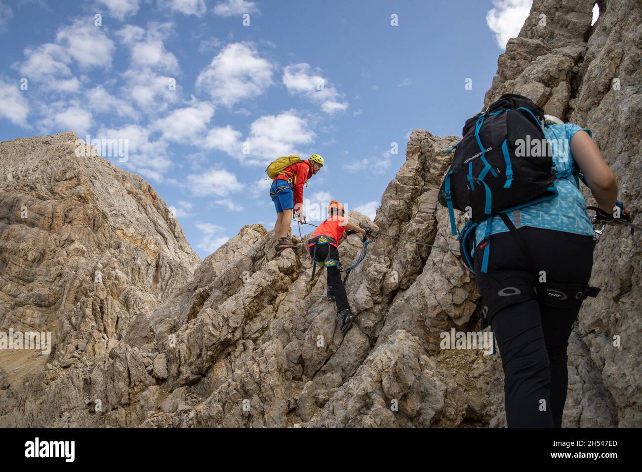Italy Veneto - Hikers along the Ferrata Formenton Stock Photo - Alamy