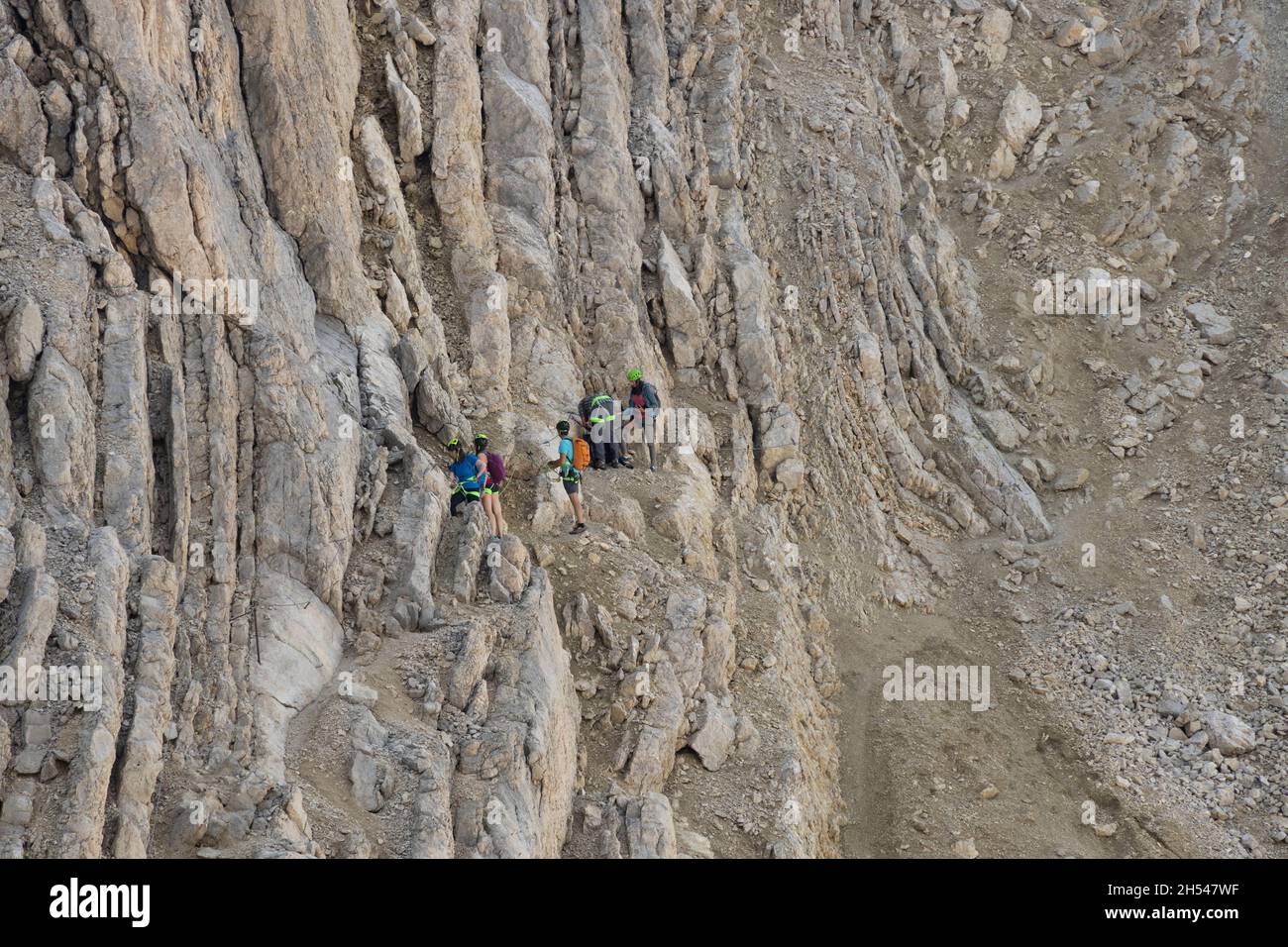 Italy Veneto - Hikers along the Ferrata Formenton Stock Photo - Alamy