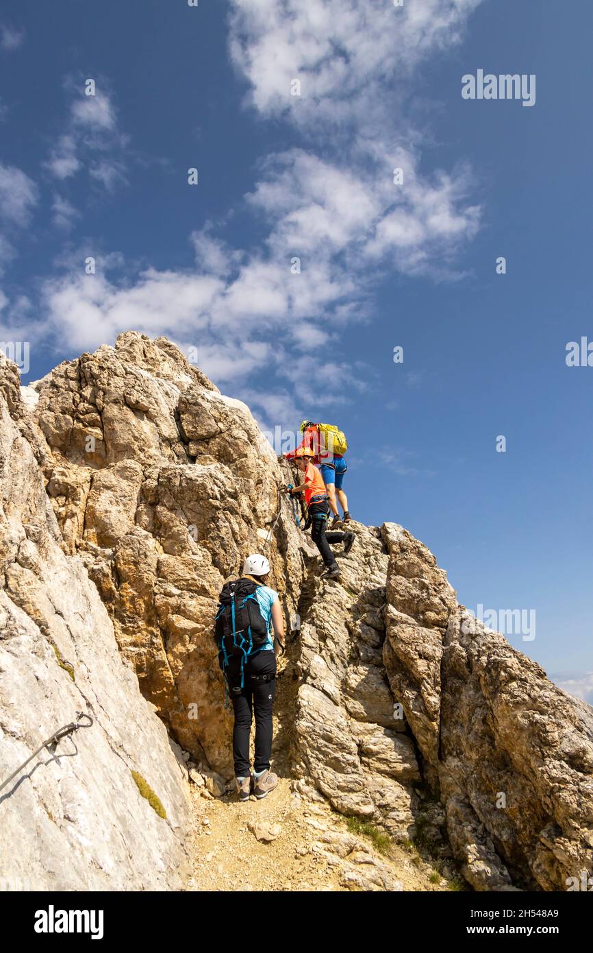 Italy Veneto - Hikers along the Ferrata Formenton Stock Photo - Alamy
