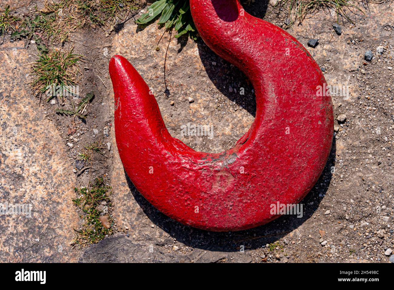 A red securing Metal Hook - Charlestown, Cornwall, UK Stock Photo - Alamy