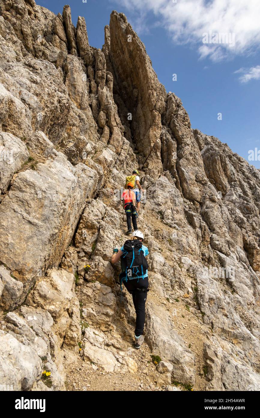 Italy Veneto - Hikers along the Ferrata Formenton Stock Photo - Alamy